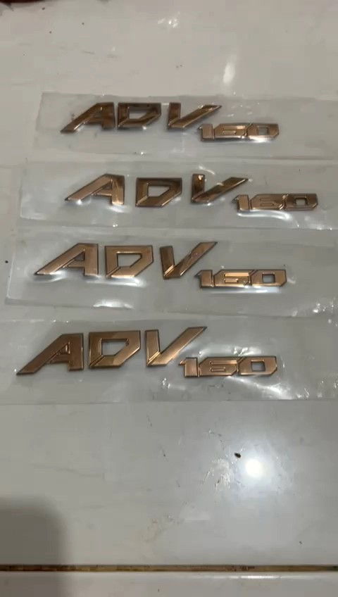 EMBLEM LOGO TIMBUL MOTOR HONDA ADV 160 WARNA GOLD DAN SILVER ORIGINAL ...